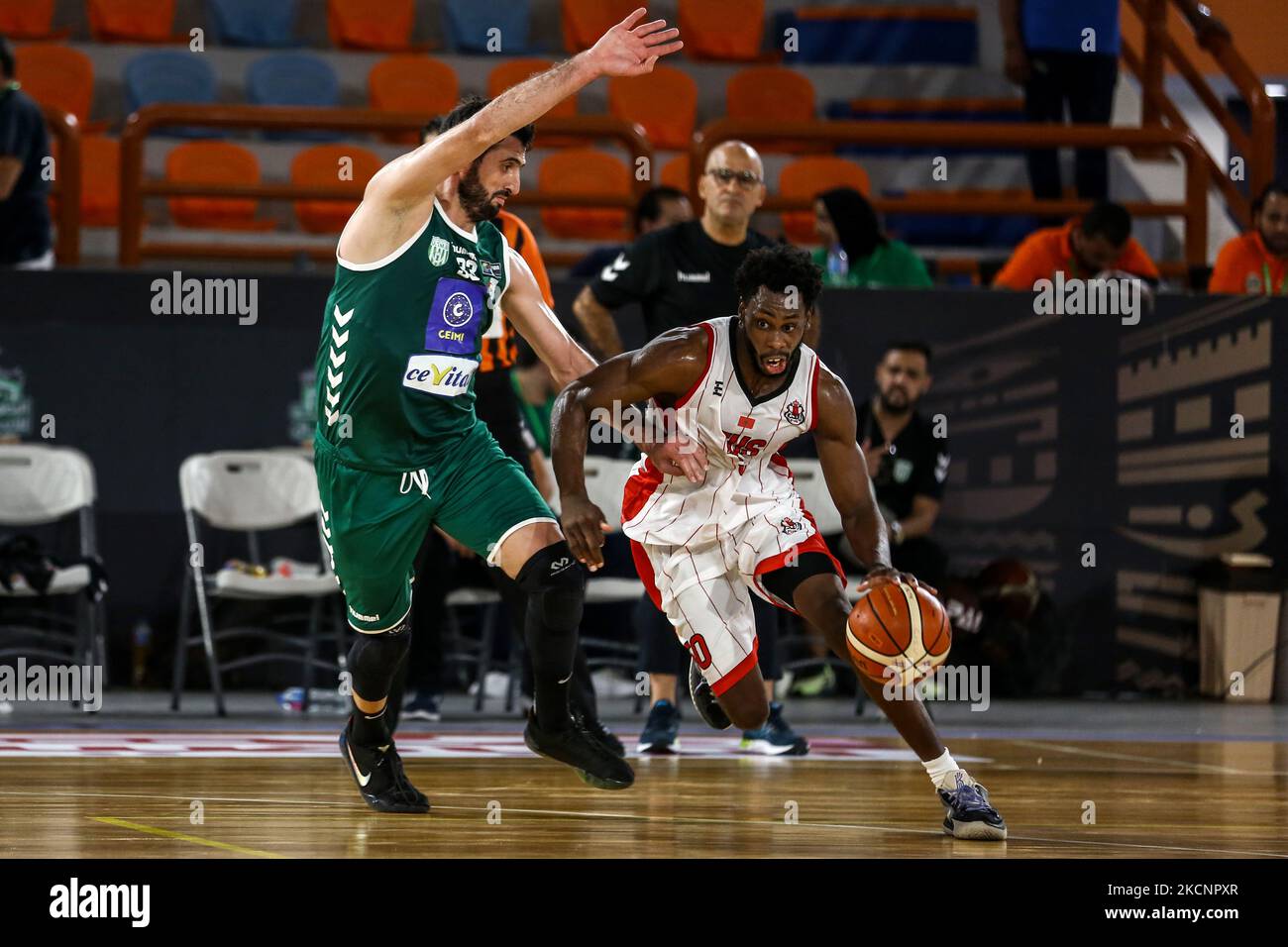 (50) Marcus Wesley from Fath Team (Morocco) fight for the ball with (33 ...