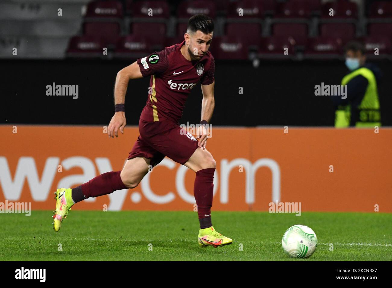 Adrian Paun of CFR 1907 Cluj in action against of Randers FC during ...