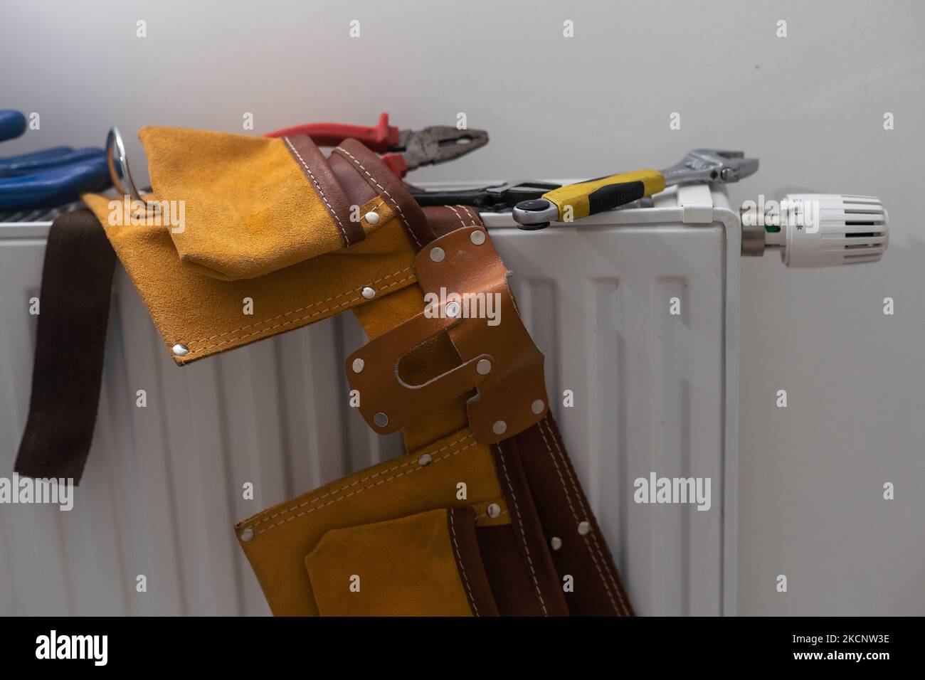 tools on the radiator heat Stock Photo - Alamy