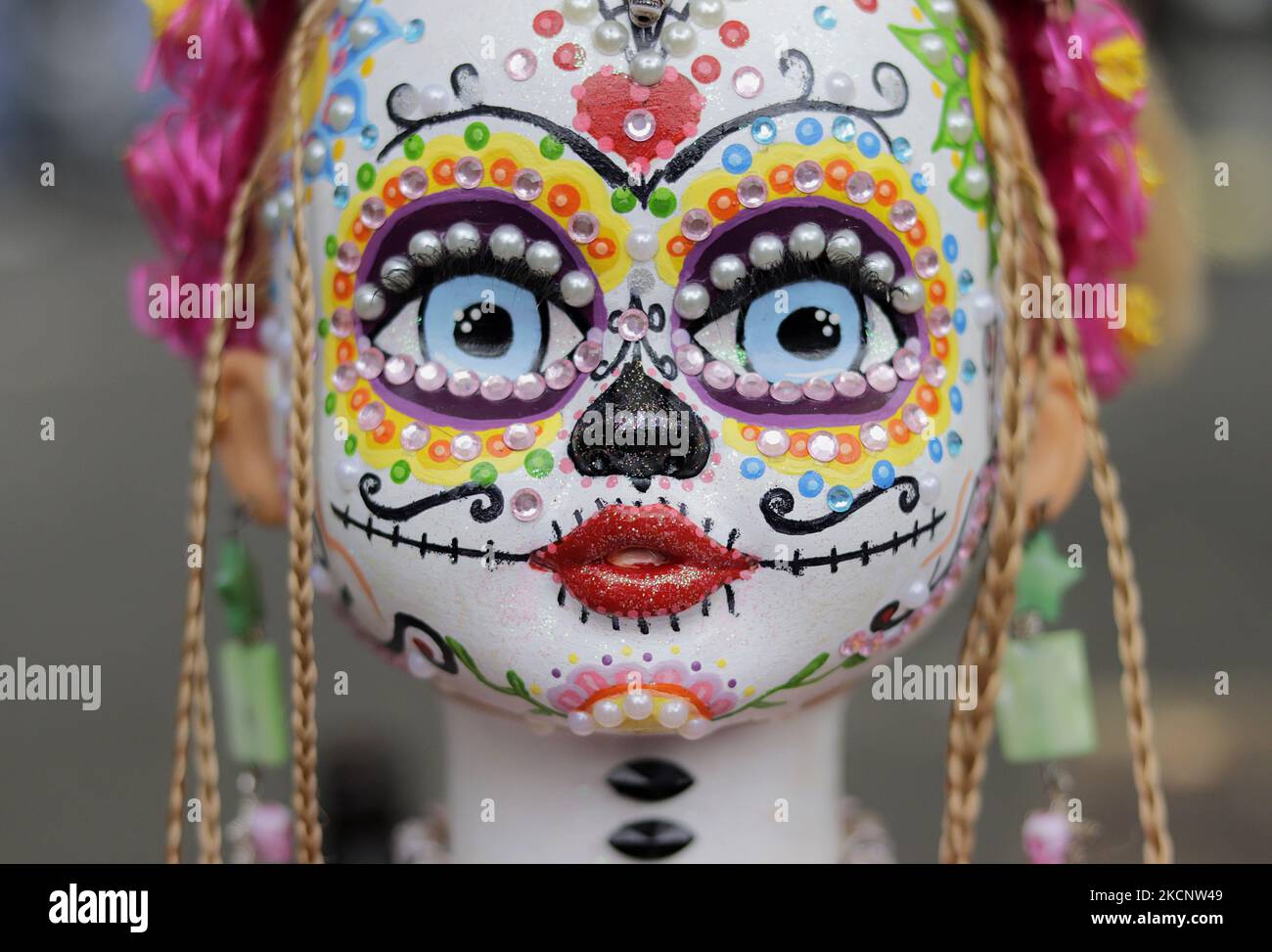 A doll is characterised as La Catrina in allusion to Santa Muerte ...