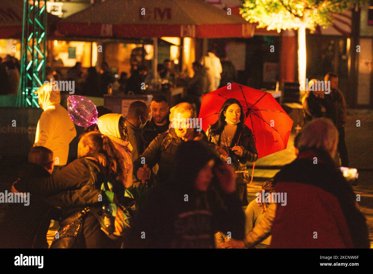 People enjoy light show at Kennedy platz in Essen during Essen light ...
