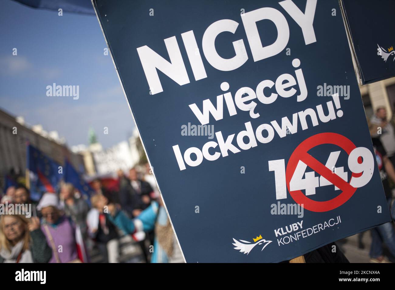 No more lockdown placard seen during protest against compulsory ...