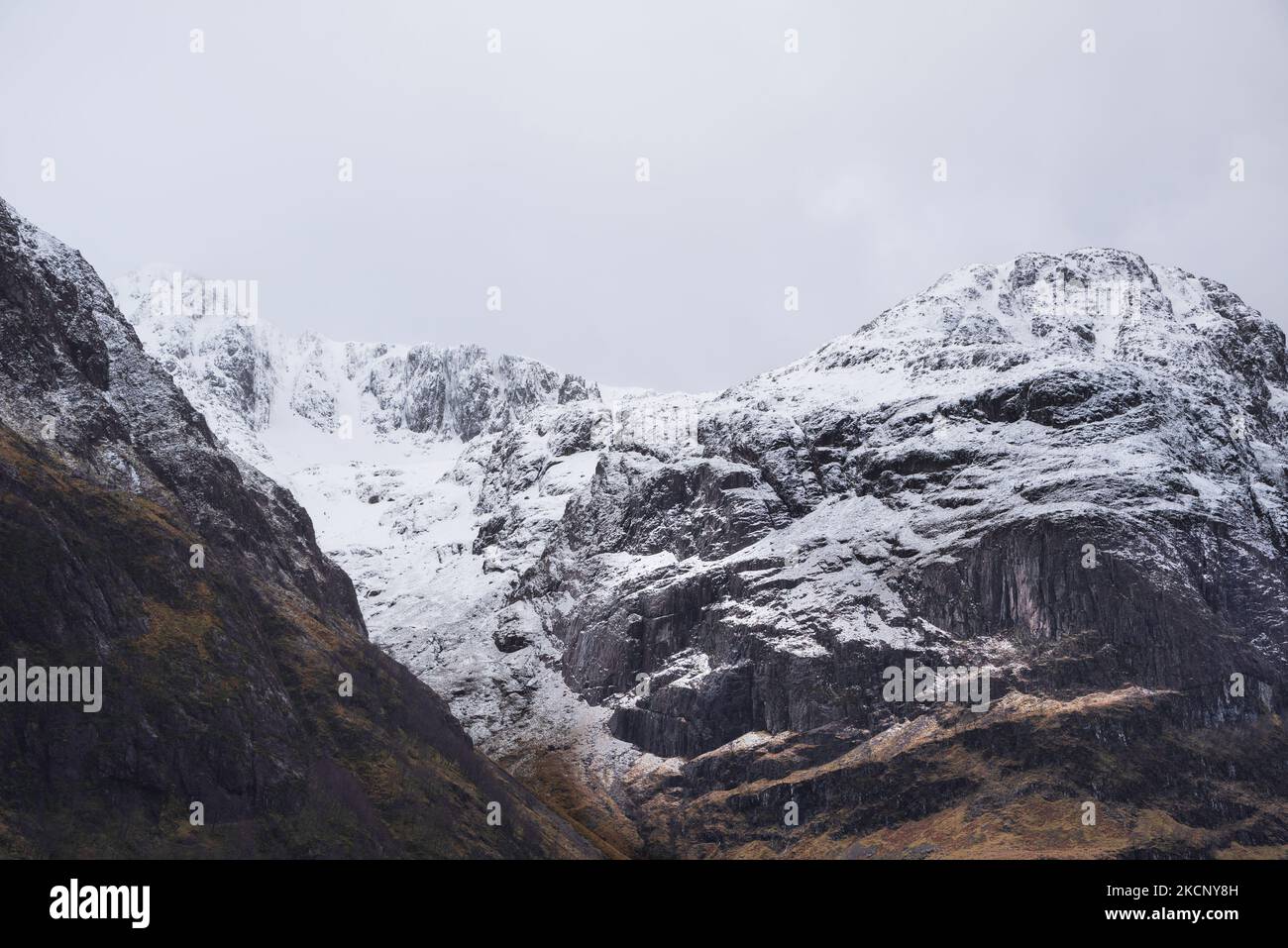 Epic Winter landscape image of snowcapped Three Sisters mountain range ...