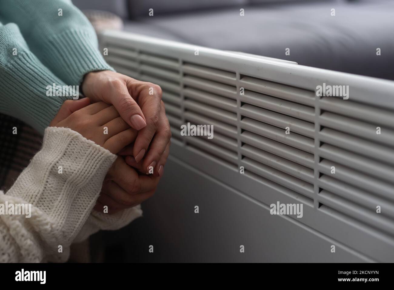 Woman radiator cosy hi-res stock photography and images - Alamy