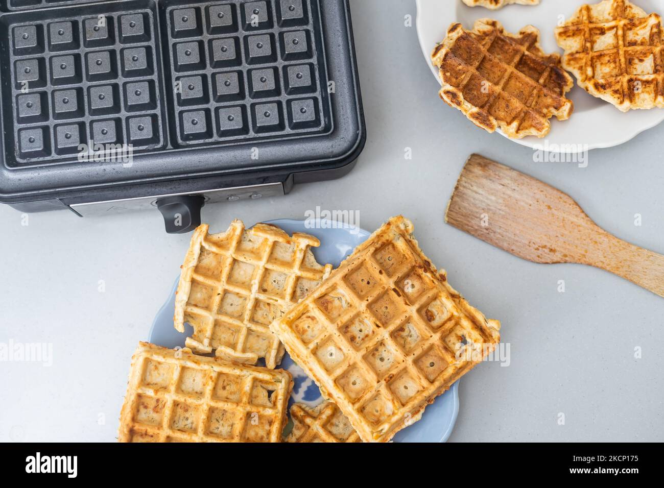 Homemade Mini waffles on Waffle Maker Stock Photo - Alamy