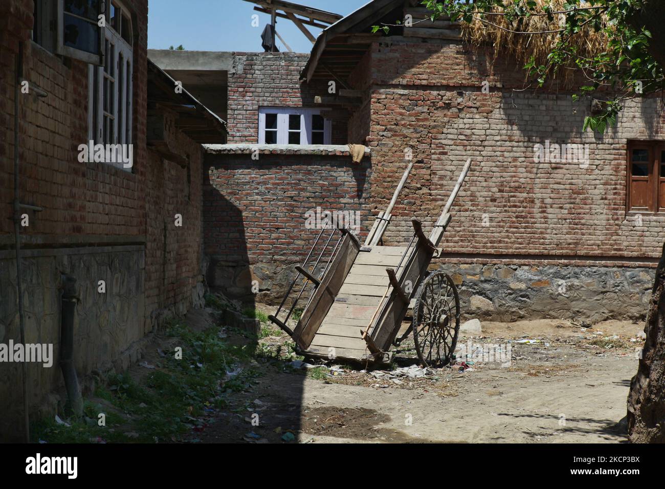 Traditional cart resting in a laneway in a small village in Kashmir ...