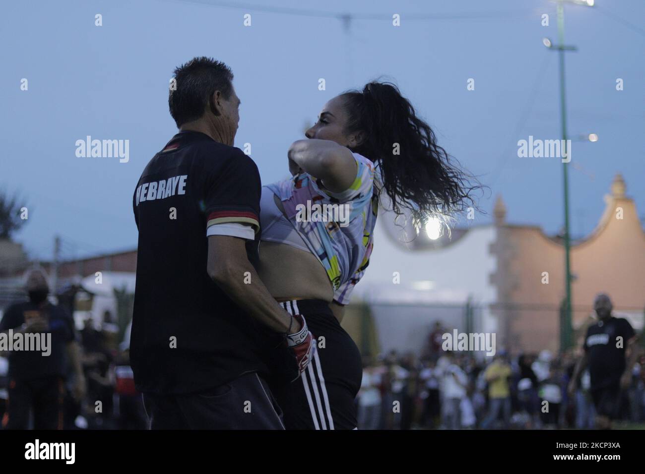 Jessica, member of Las Gardenias, a transgender football team (light ...