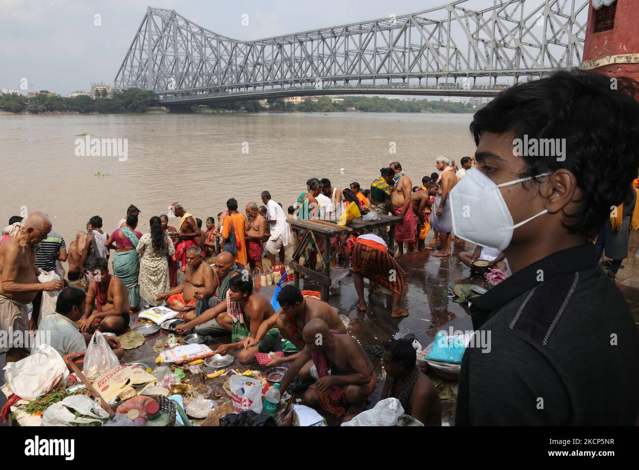 A Boy warring protective Face Mask against Coronavirus --Hindu devotees ...