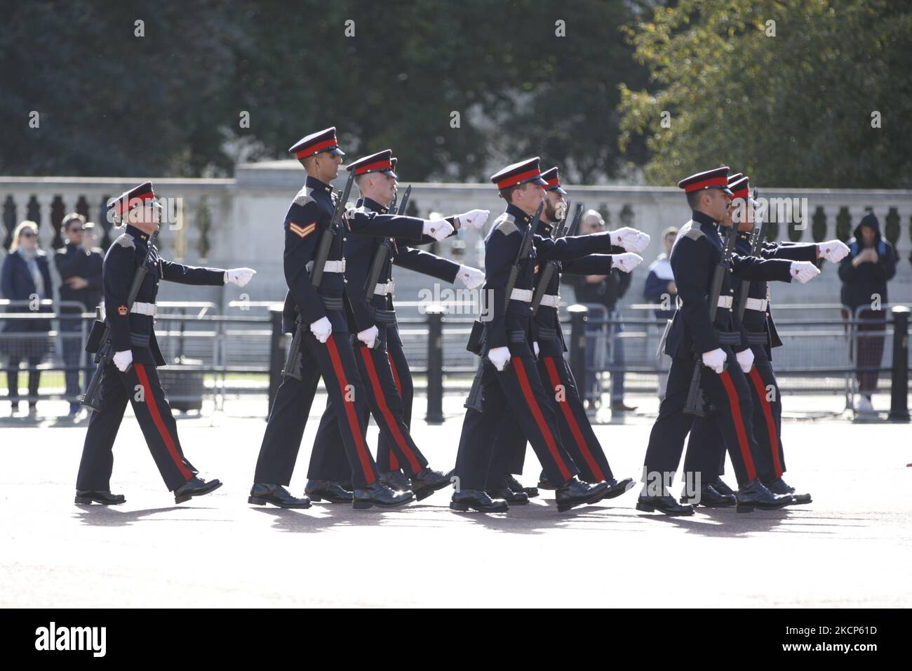 Members of the Royal Regiment of Canadian Artillery march along the Mall from St James's Palace ...