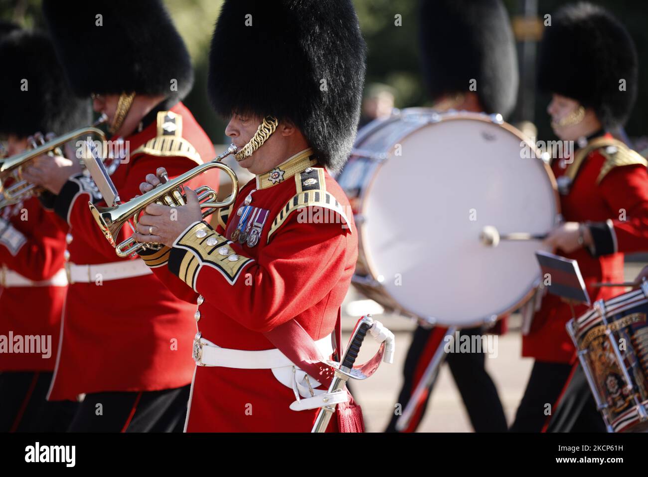 Band members of the Coldstream Guards regiment of the British Army Household Division march from ...