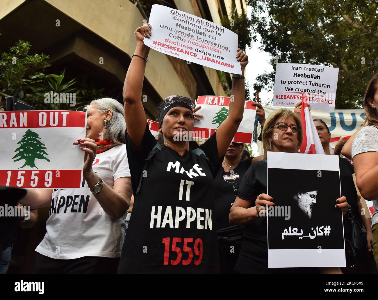 People stage a protest against visit of Iranian Foreign Minister ...
