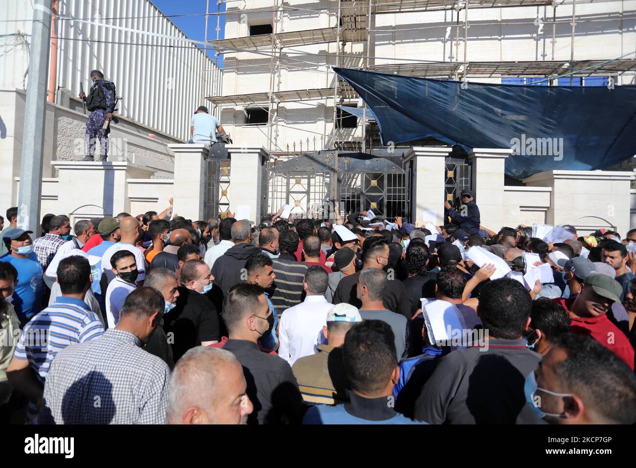 Palestinians apply for Israeli work permits in Deir Al-Balah city in ...