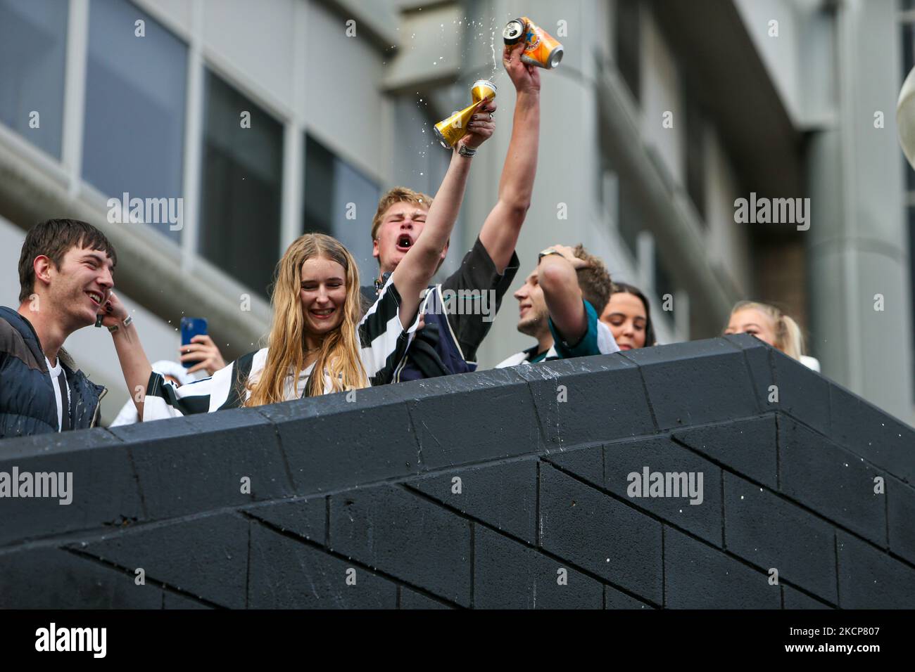 Newcastle United fans celebrate the sale of the club to the Consortium ...