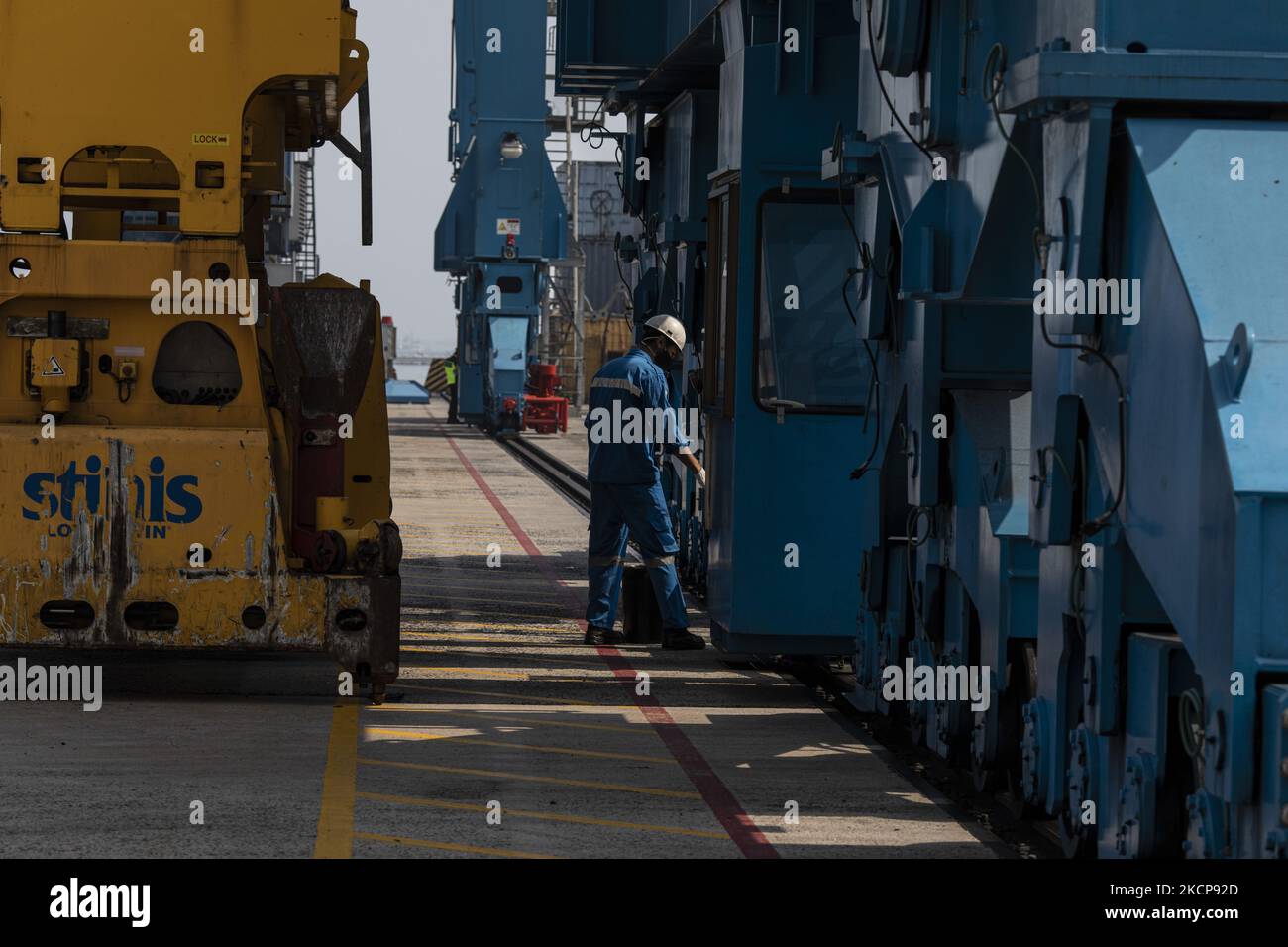 Container loading and unloading activities at the Tanjung Priok port ...