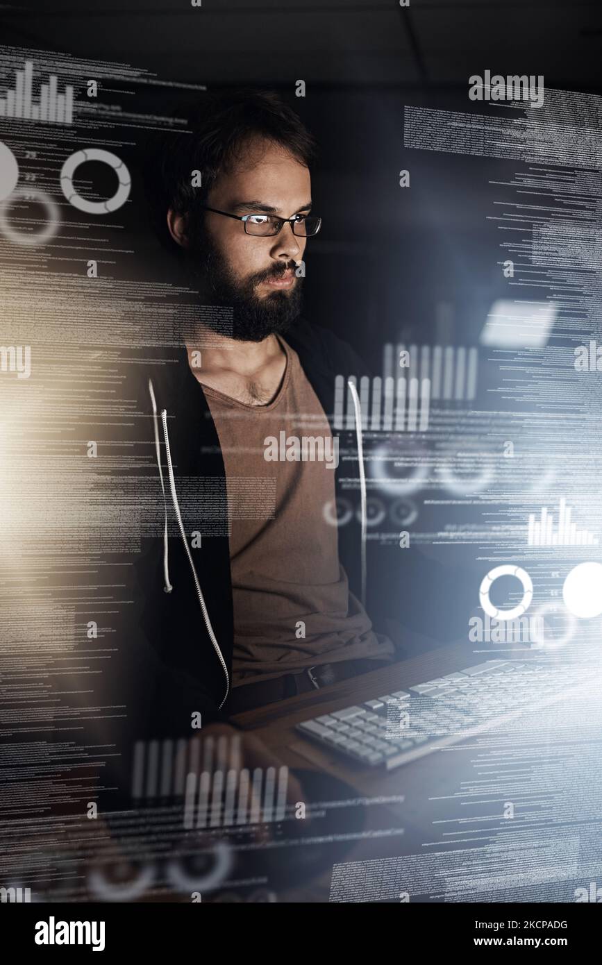 No glitches get past him. a young computer programmer working on source ...