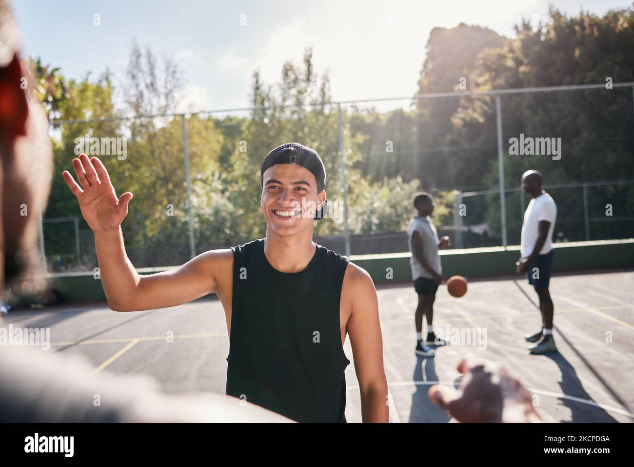 Basketball, welcome and high five, team and greeting on outdoor sport ...