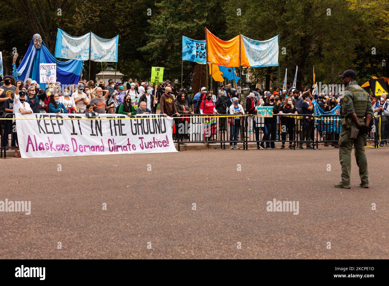 Native American activists and allies cheer on those who await arrest ...