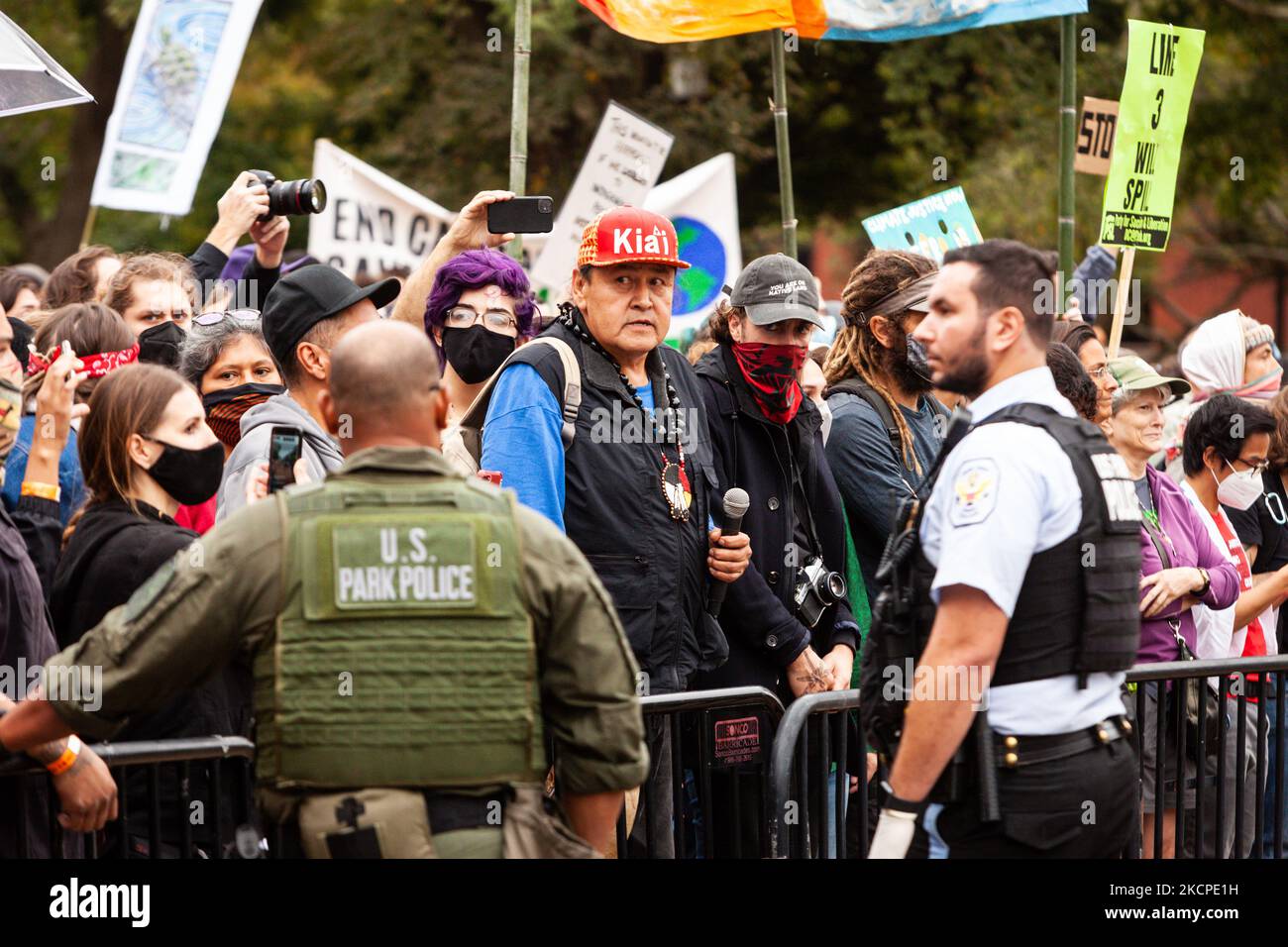 US Park Police guard a barricade while Native American activists and ...
