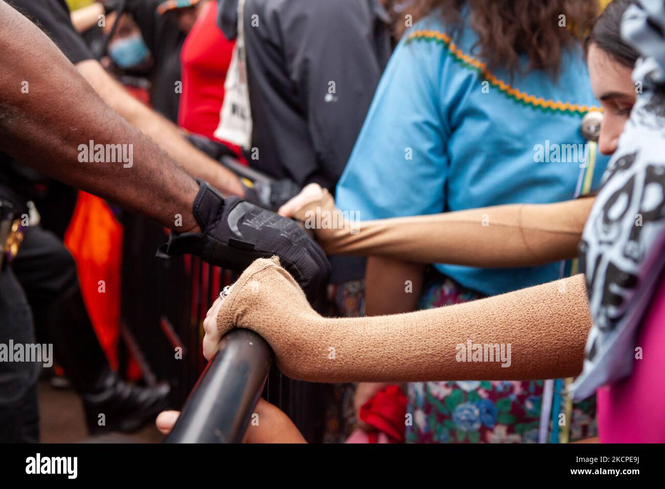 US Secret Service police push Native American activists and allies back ...