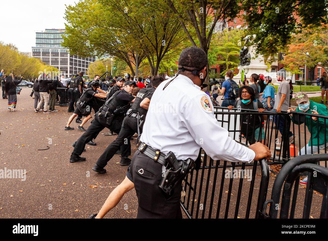 US Secret Service police push Native American activists and allies back ...