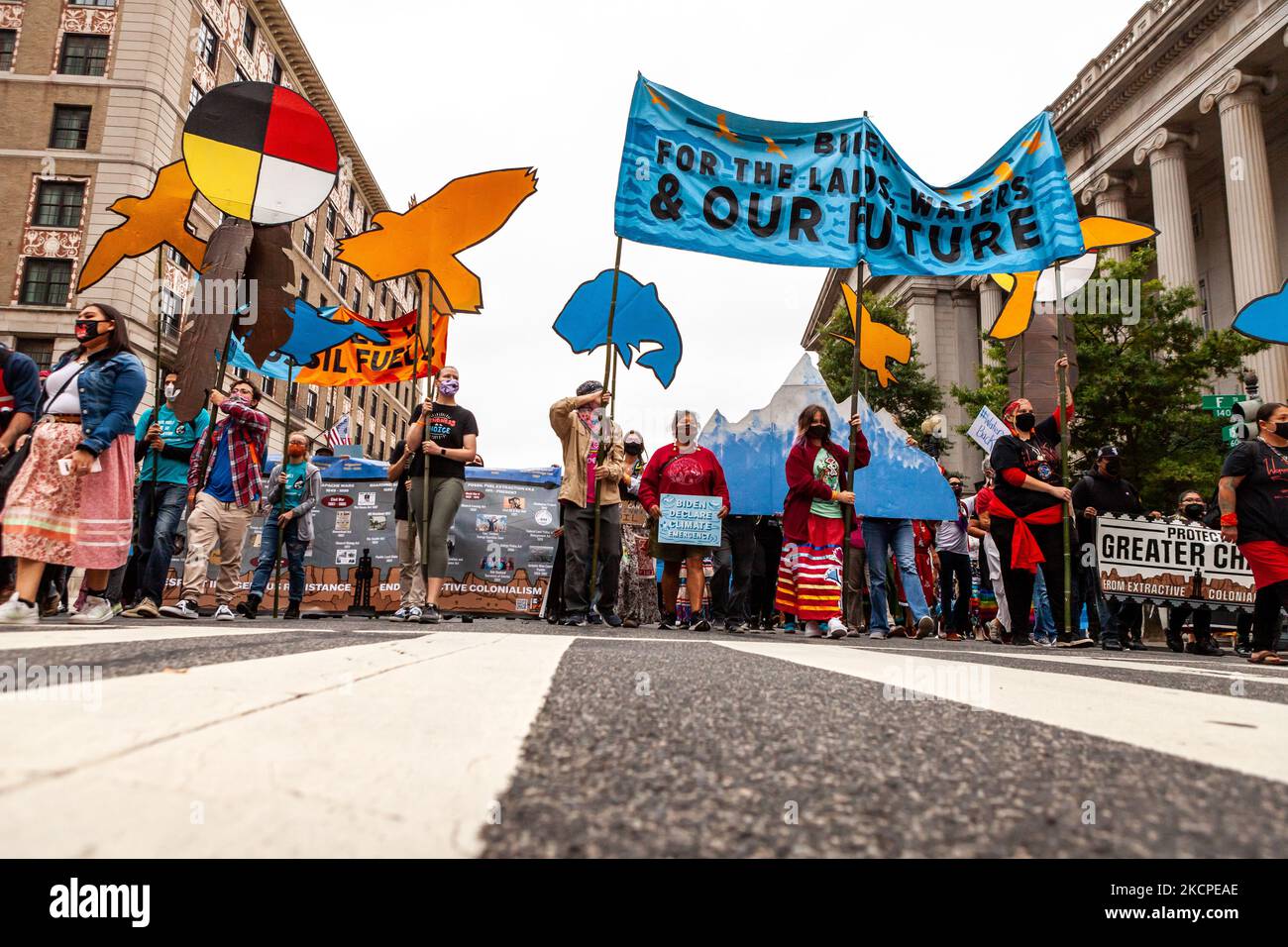 Native American activists lead a march from Freedom Plaza to the White ...