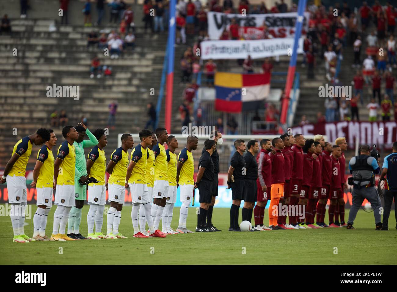 Players of Ecuador and Venezuela line up during the match between ...