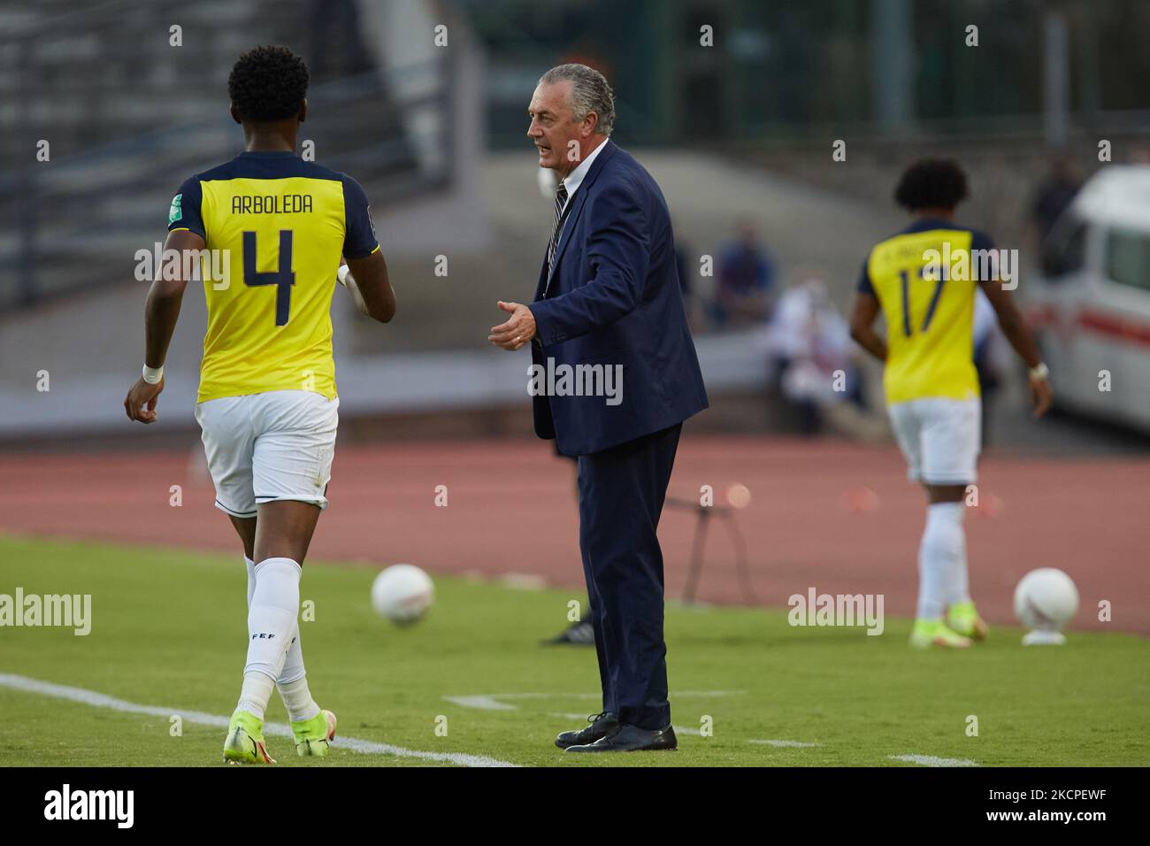 Gustavo Alfaro coah of Ecuador gives directions to Robert Arboleda of ...
