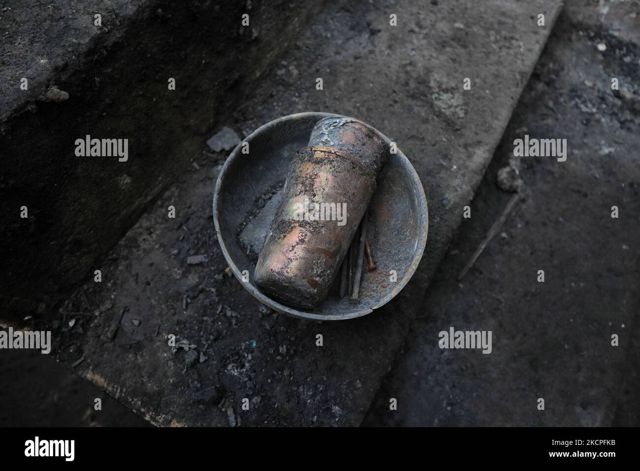 The damaged utensils lie on the floor inside the damaged residential ...