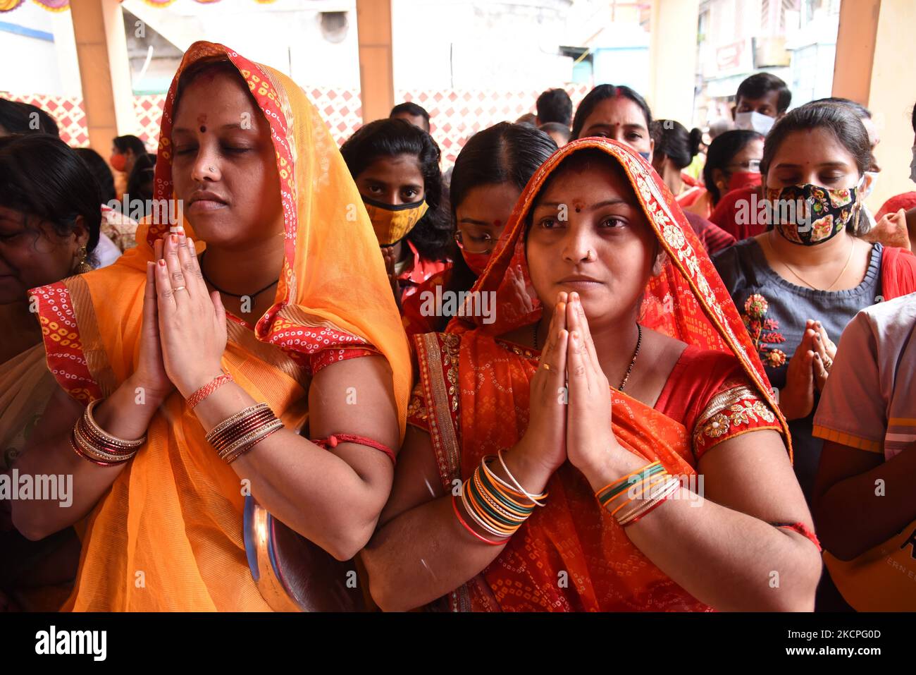 Indian Hindu devotees performs the ritual 'Anjali' on the occasion of ...