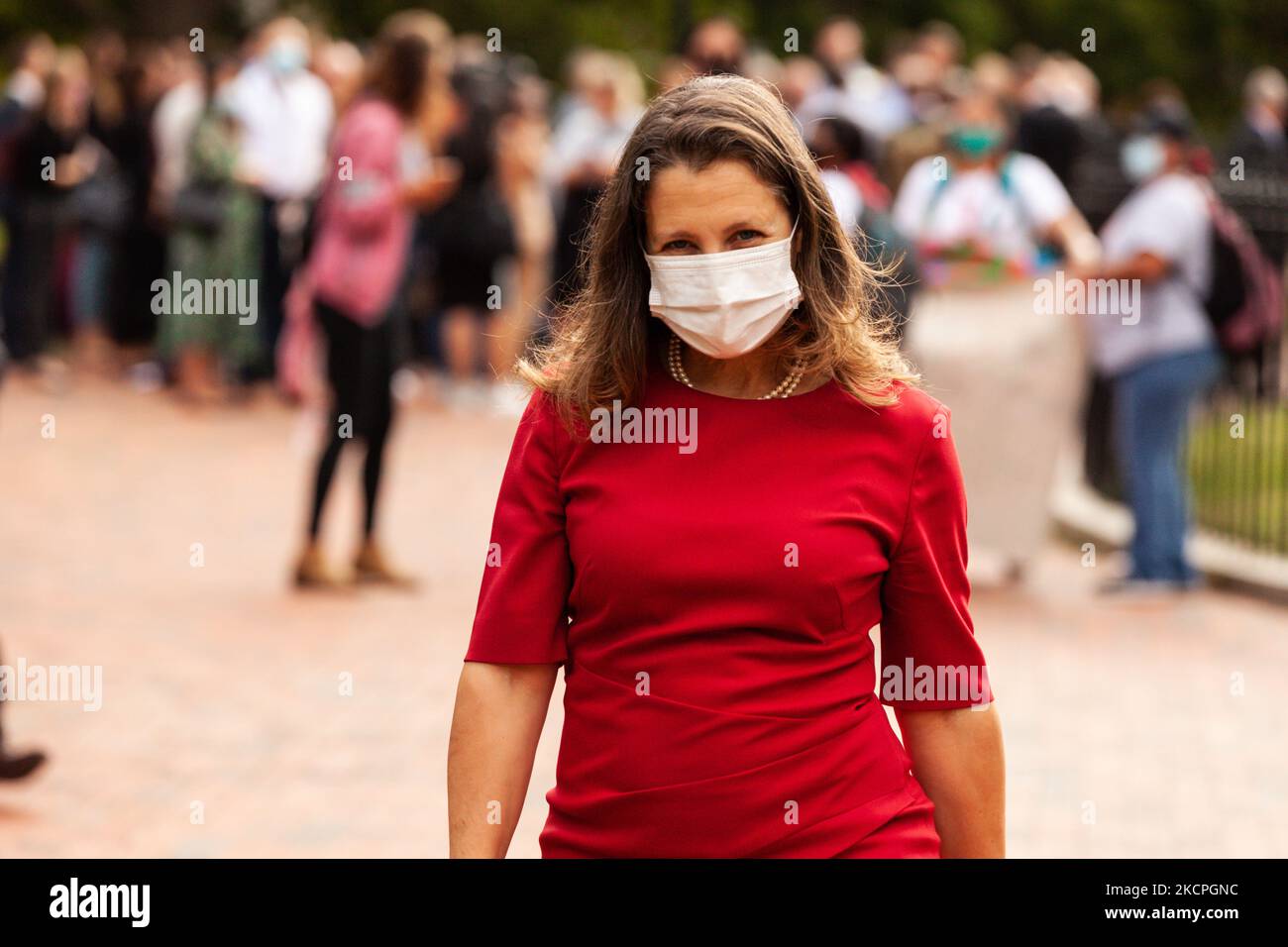 Canadian Finance Minister Chrystia Freeland smirks as she flees a press ...