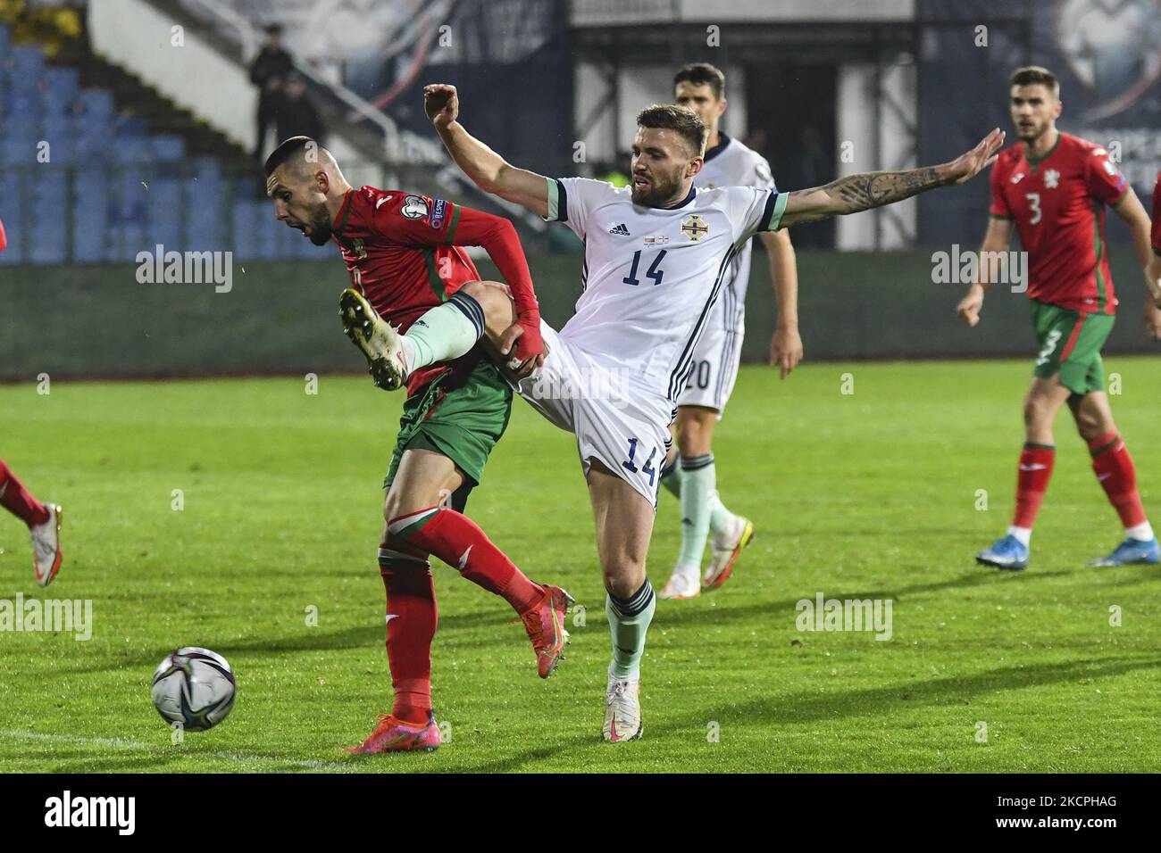 Ivan Turitsov of Bulgaria (red) and Stuart Dallas of Northern Ireland ...