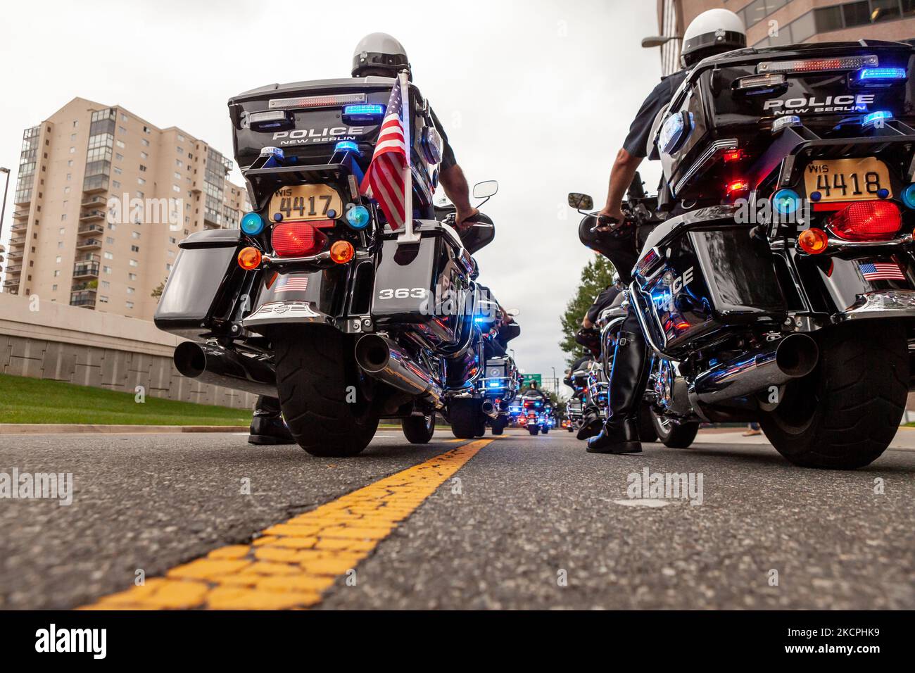 Dozens of motorcycle officers escort families of police who have been ...