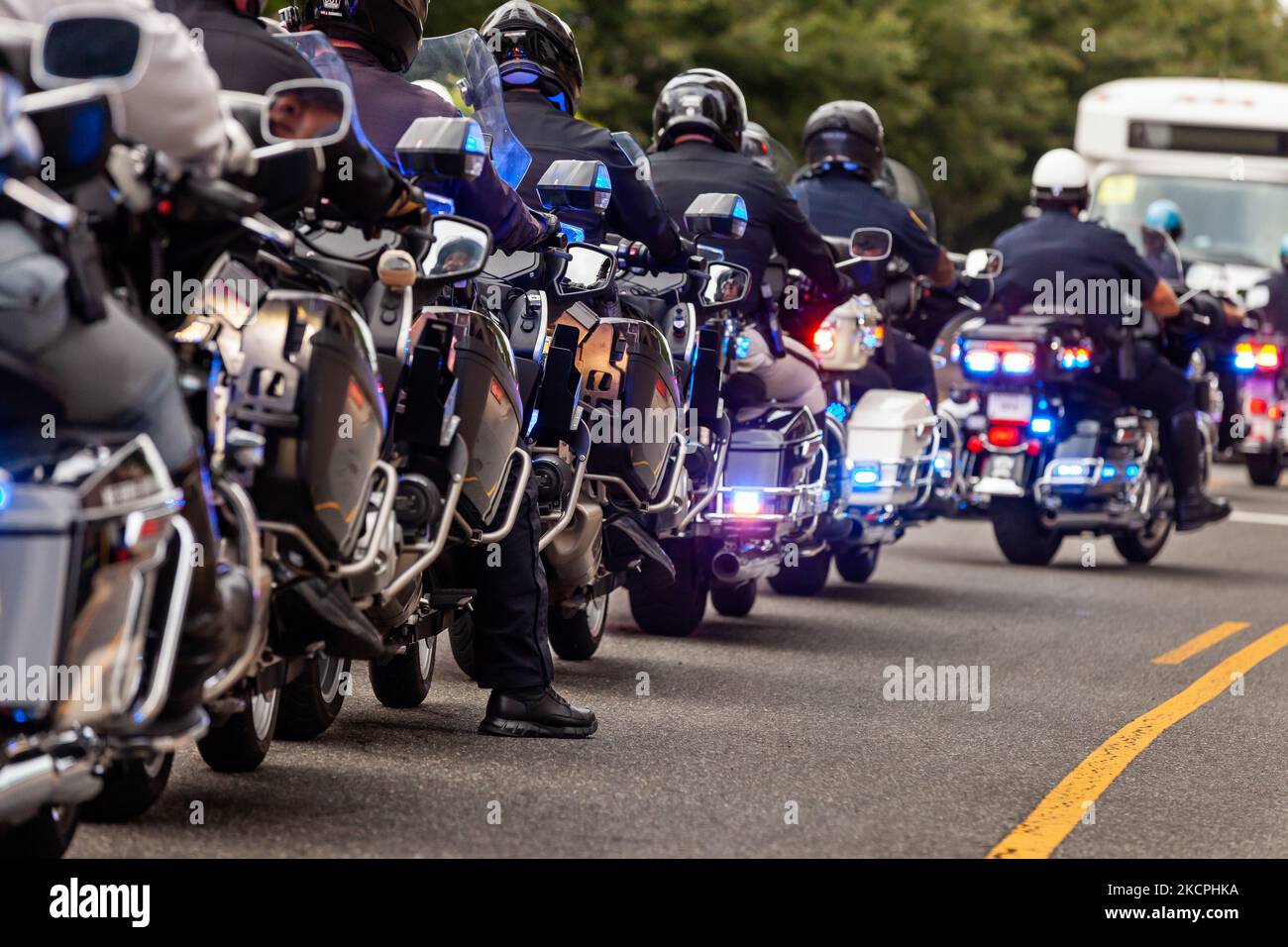 Dozens of motorcycle officers escort families of police who have been ...