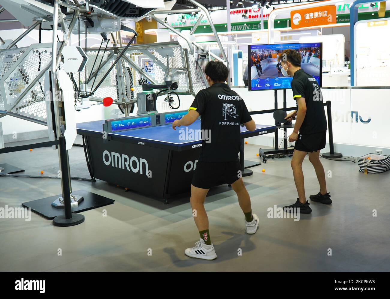 Shanghai. 5th Nov, 2022. A robot which can serve ping pong balls is seen at the booth of Omron ...