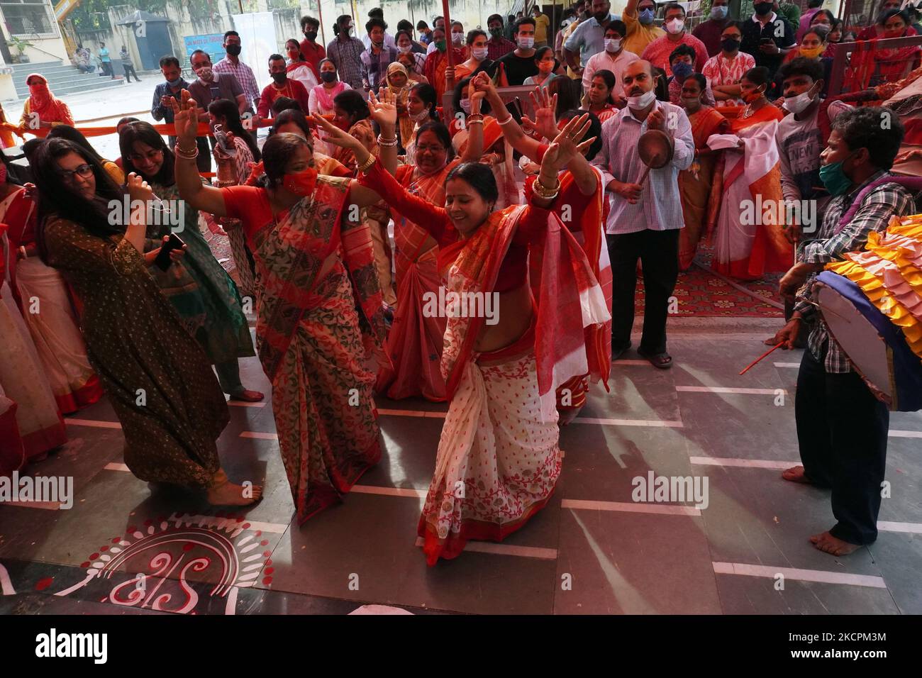 Hindu women devotees dance on the last day of the Durga Puja festival ...