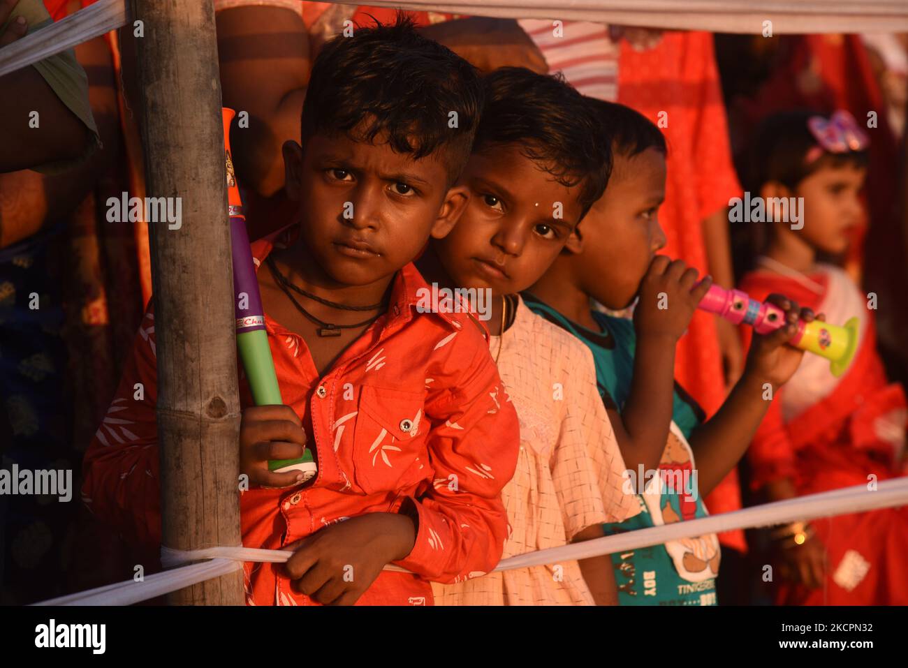 Children looking immersion of idol of the Hindu Goddess Durga on the ...