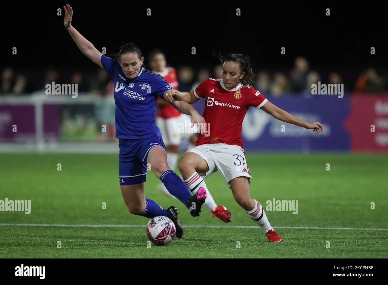 Lucy Staniforth of Manchester United battles with Durham Women's Sarah ...