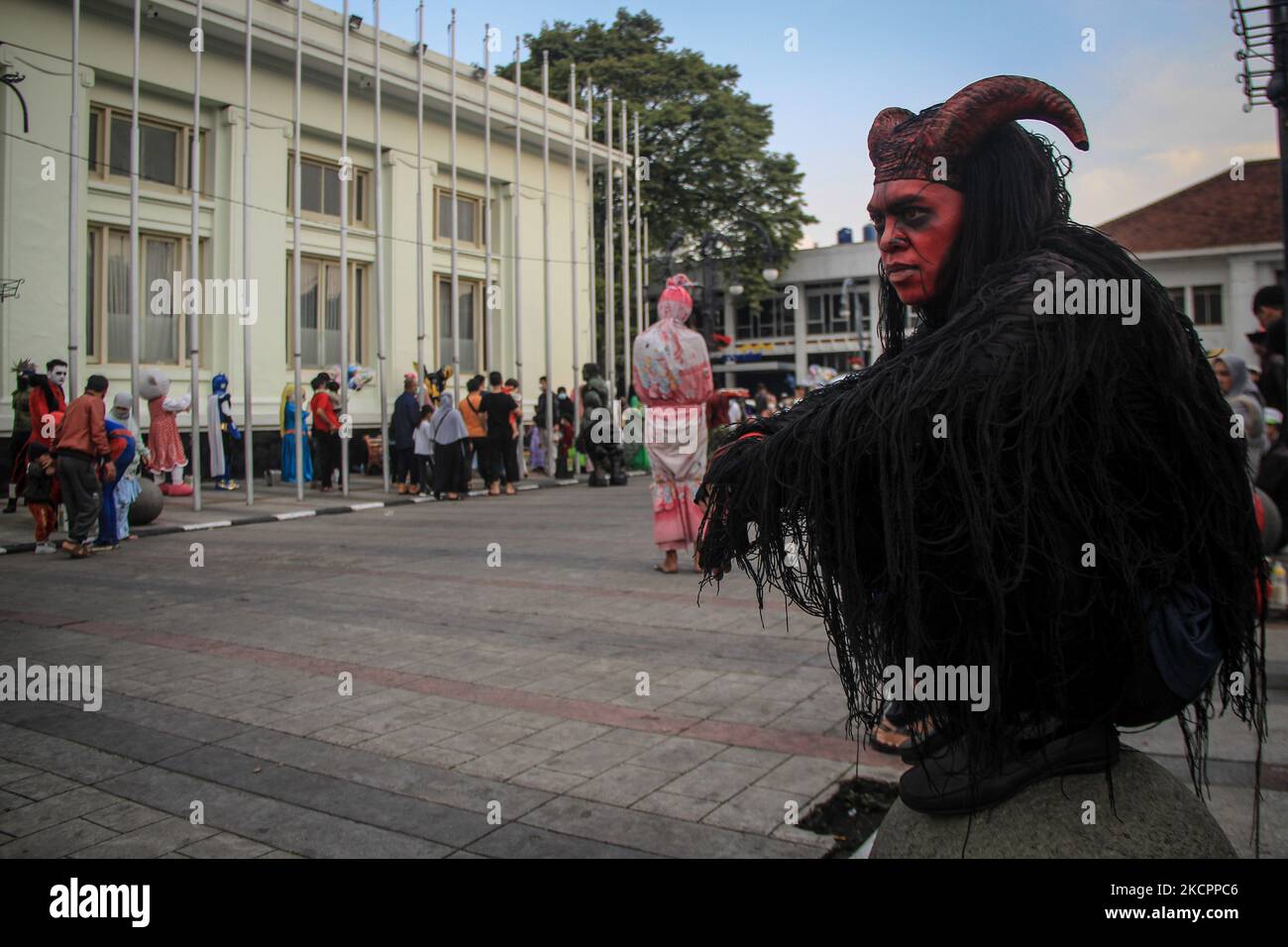 A cosplayer dressed as ghost is seen near Gedung Merdeka Tourism Area ...