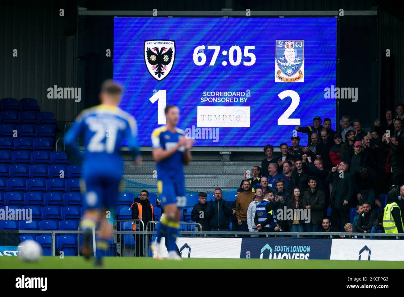 Wimbledon celebrates after scoring during the Sky Bet League 1 match ...