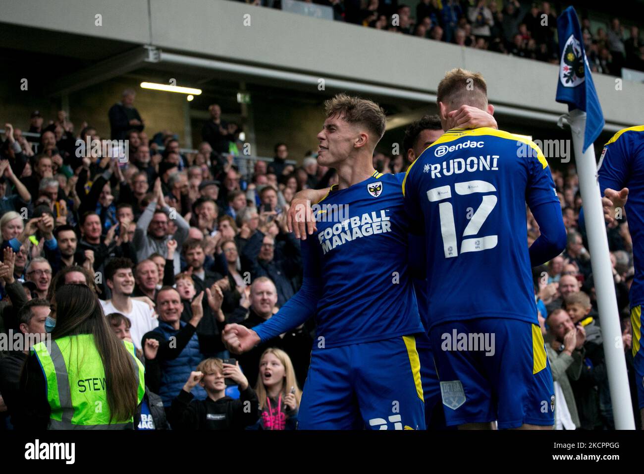 Jack Rudoni of AFC Wimbledon celebrates after scoring during the Sky ...