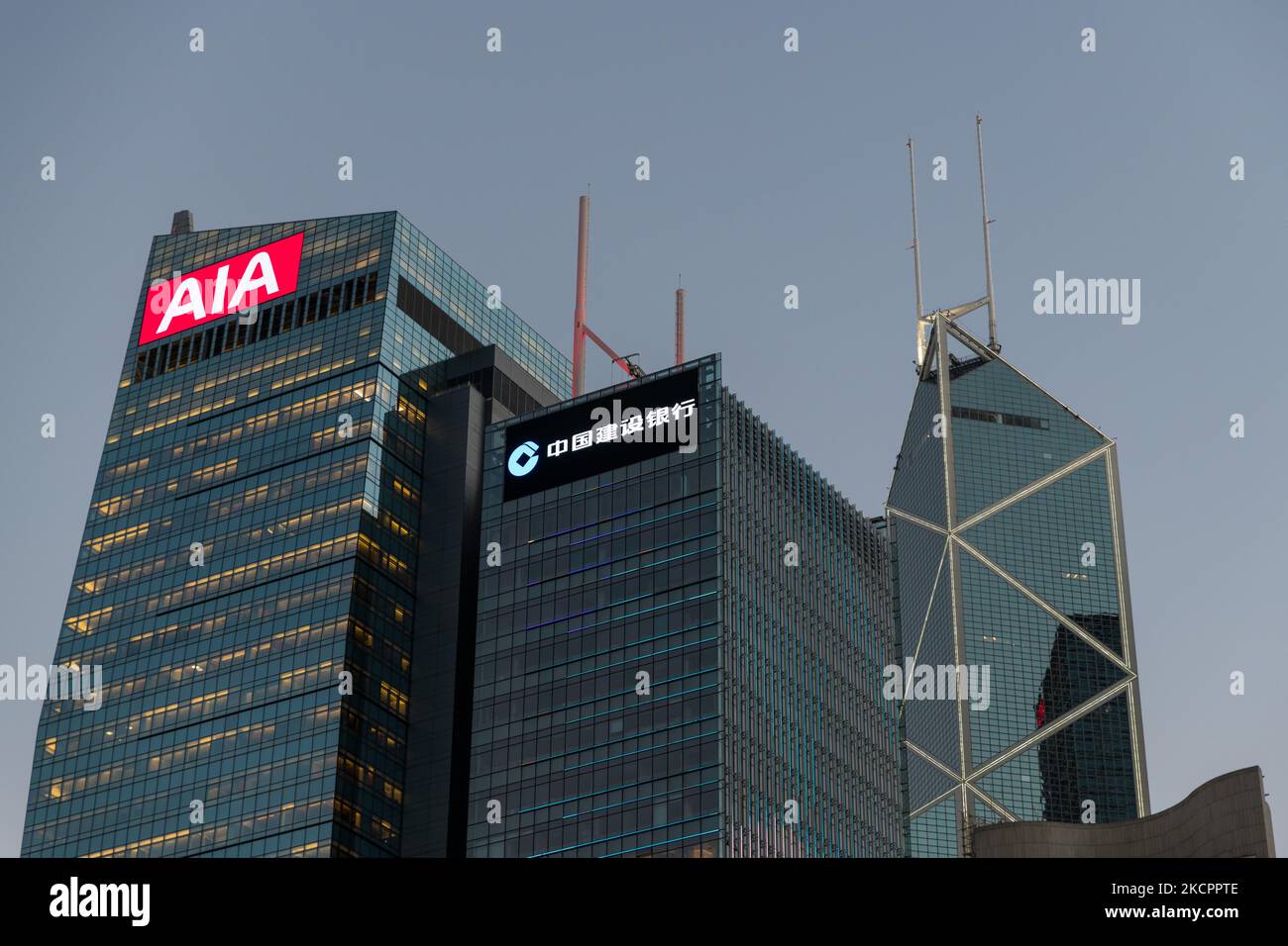 The buildings of AIA (left), China Construction Bank (center) and Bank ...