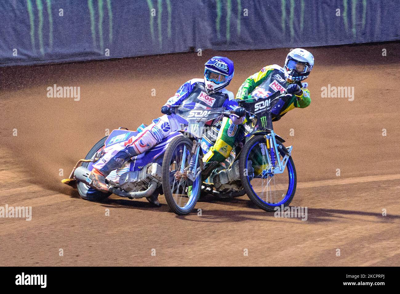 Jason Doyle of Australia (White) locks up behind Dmitri Berge of France ...