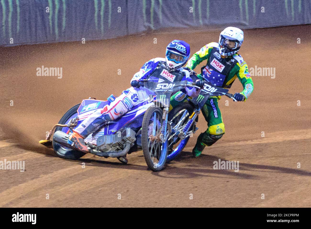 Jason Doyle of Australia (White) locks up behind Dmitri Berge of France ...