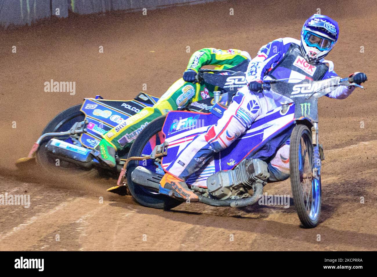 Jason Doyle of Australia (White) locks up behind Dmitri Berge of France ...