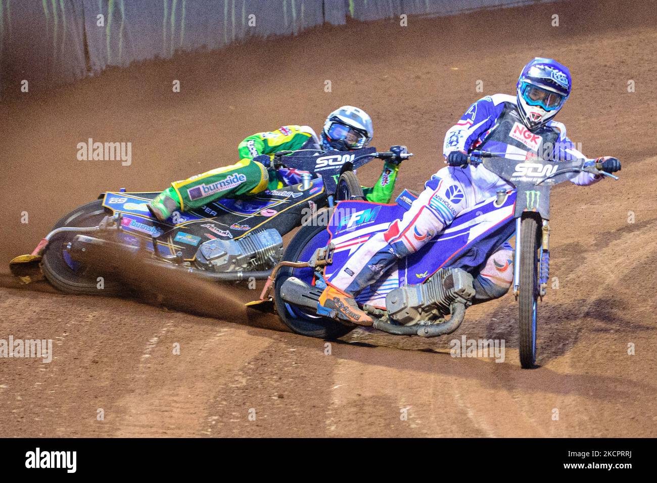 Jason Doyle of Australia (White) locks up behind Dmitri Berge of France ...
