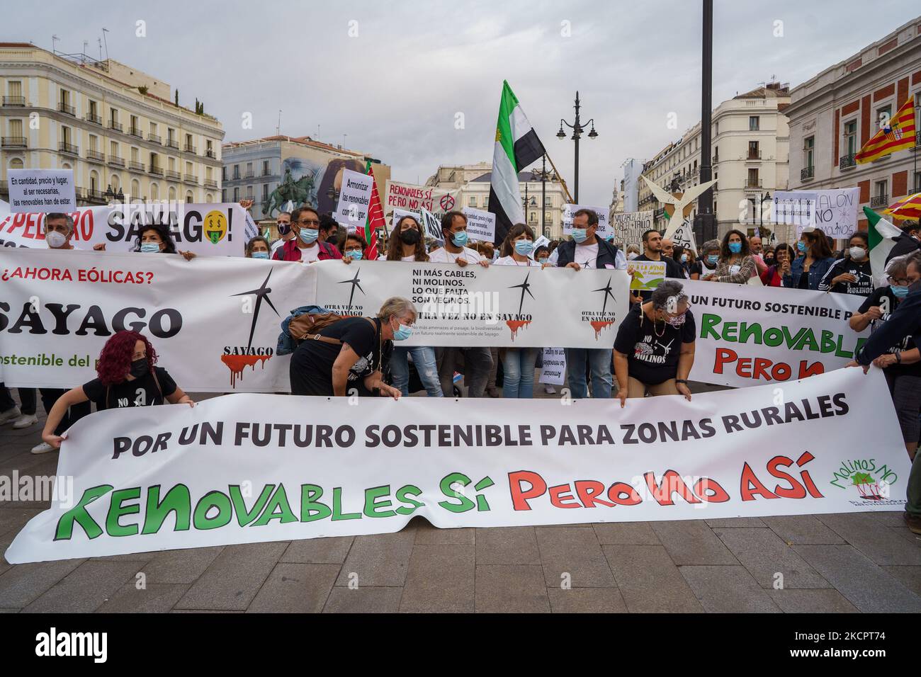 protesters during a demonstration calling for a "distributed and fair ...