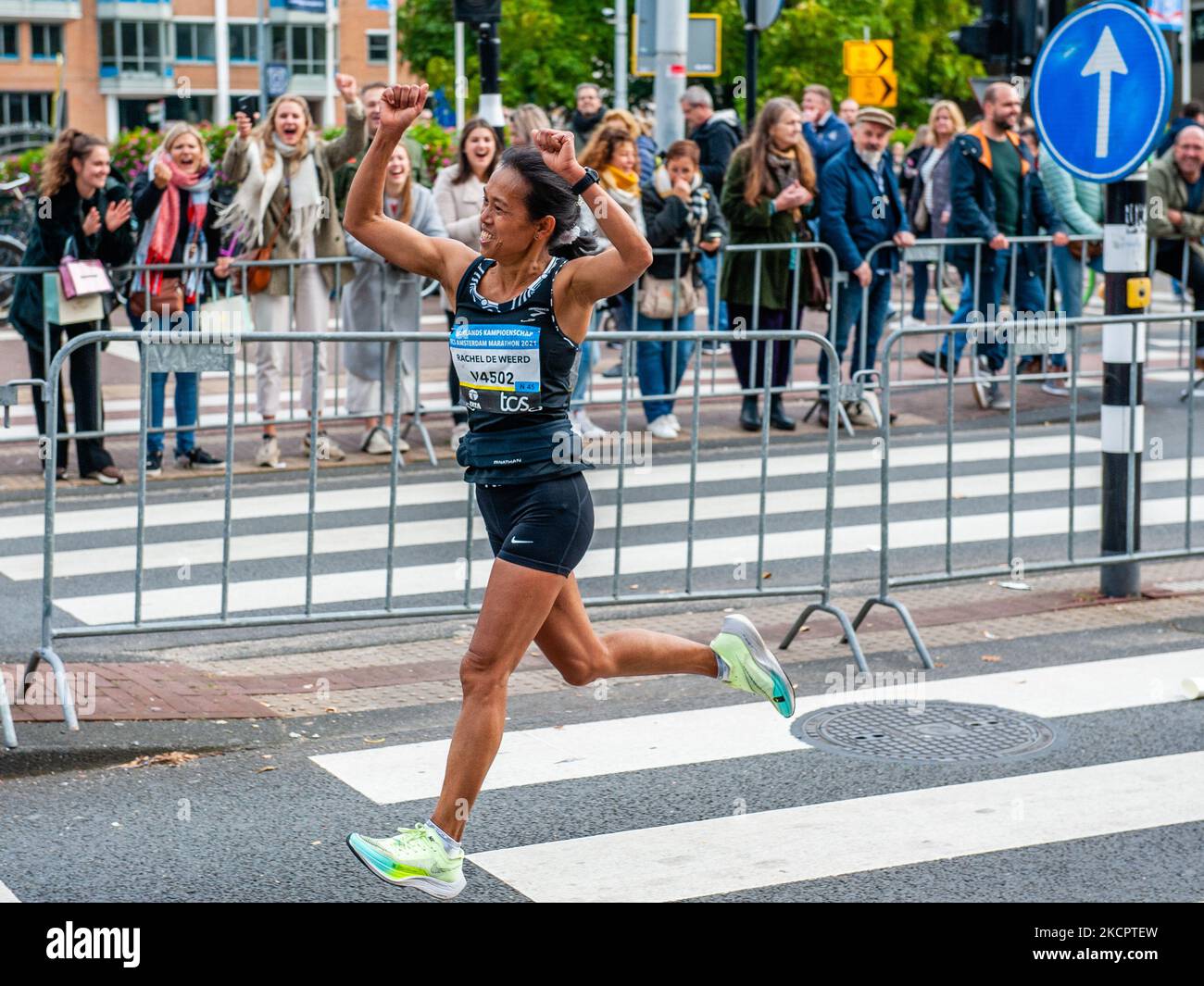 Runners passing by the Rijksmuseum during the last kilometers of the ...