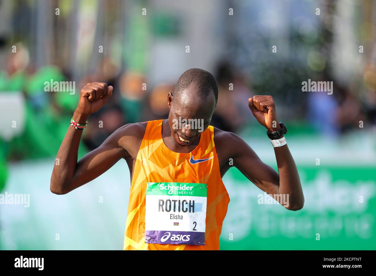 Kenya's Elisha Rotich celebrates on the finish line as he wins the men ...