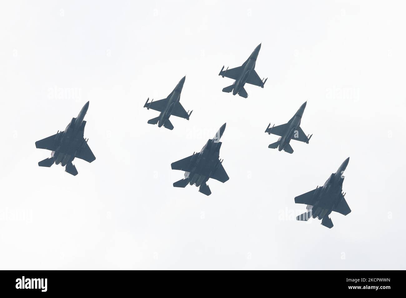 Three Republic of Singapore Air Force (RSAF) F-16C/Ds and three F-15SGs ...