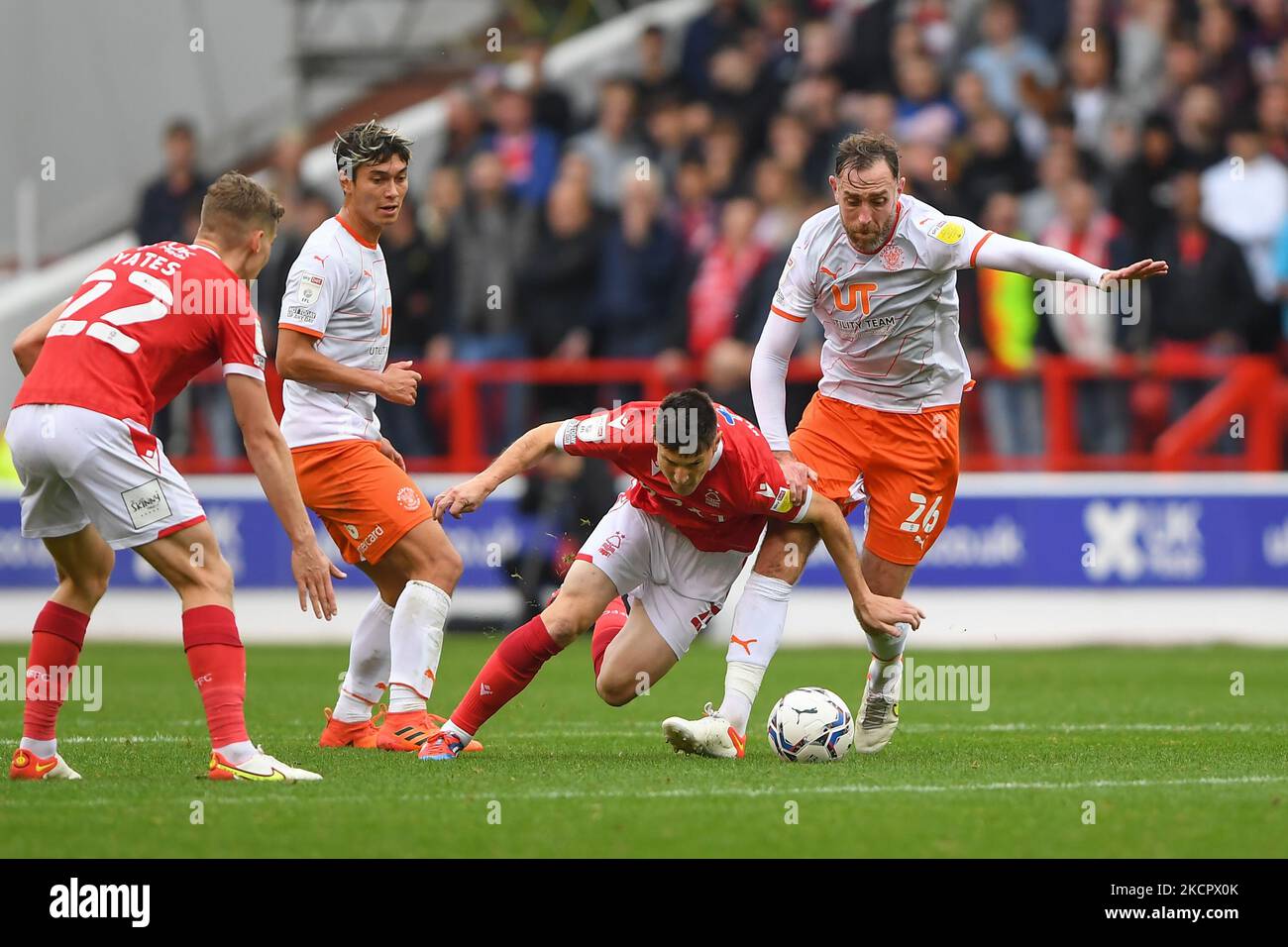 Joe Lolley of Nottingham Forest battles with Richard Keogh of Blackpool ...
